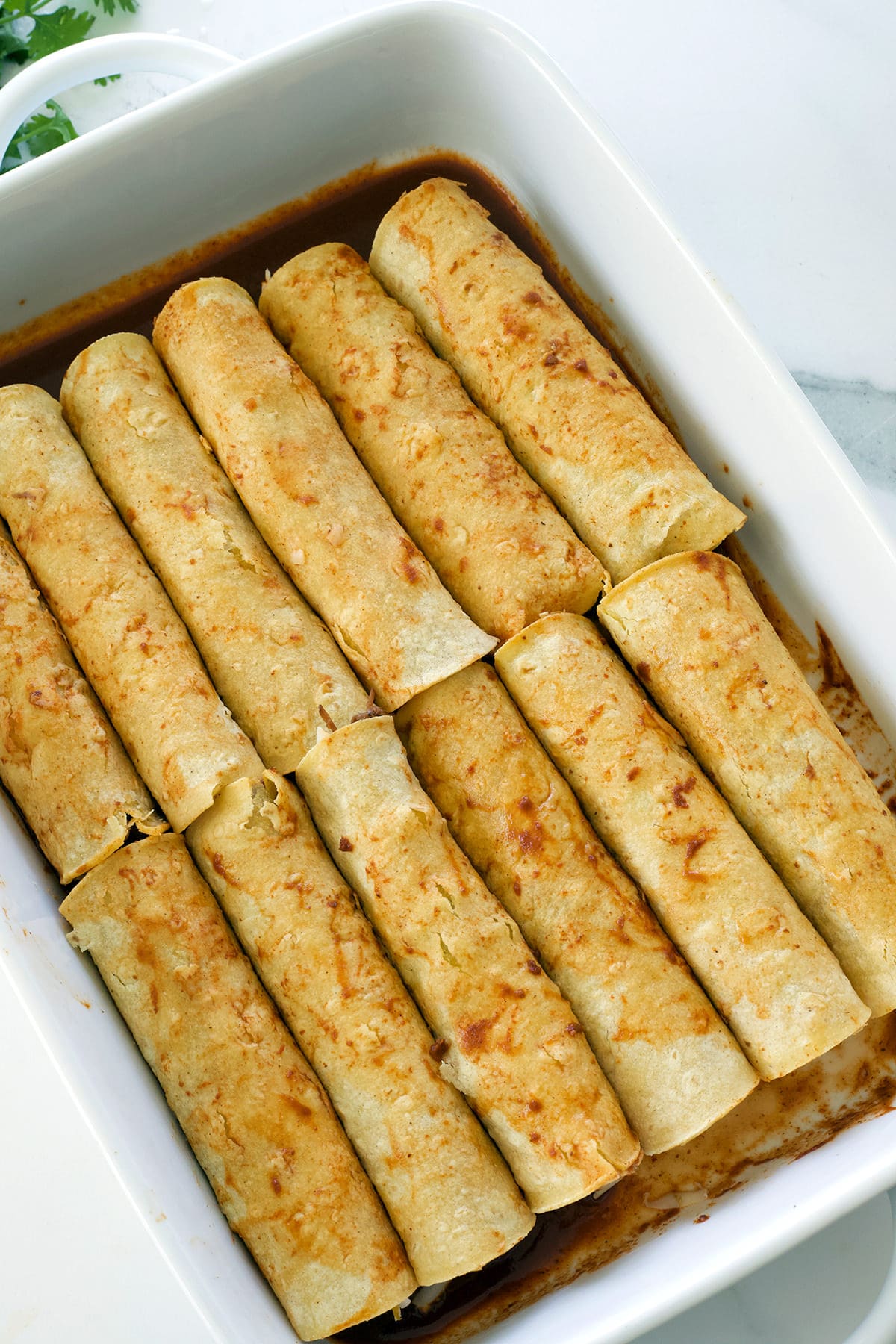 Mexican Shredded Beef Enchiladas - Foodie and Wine